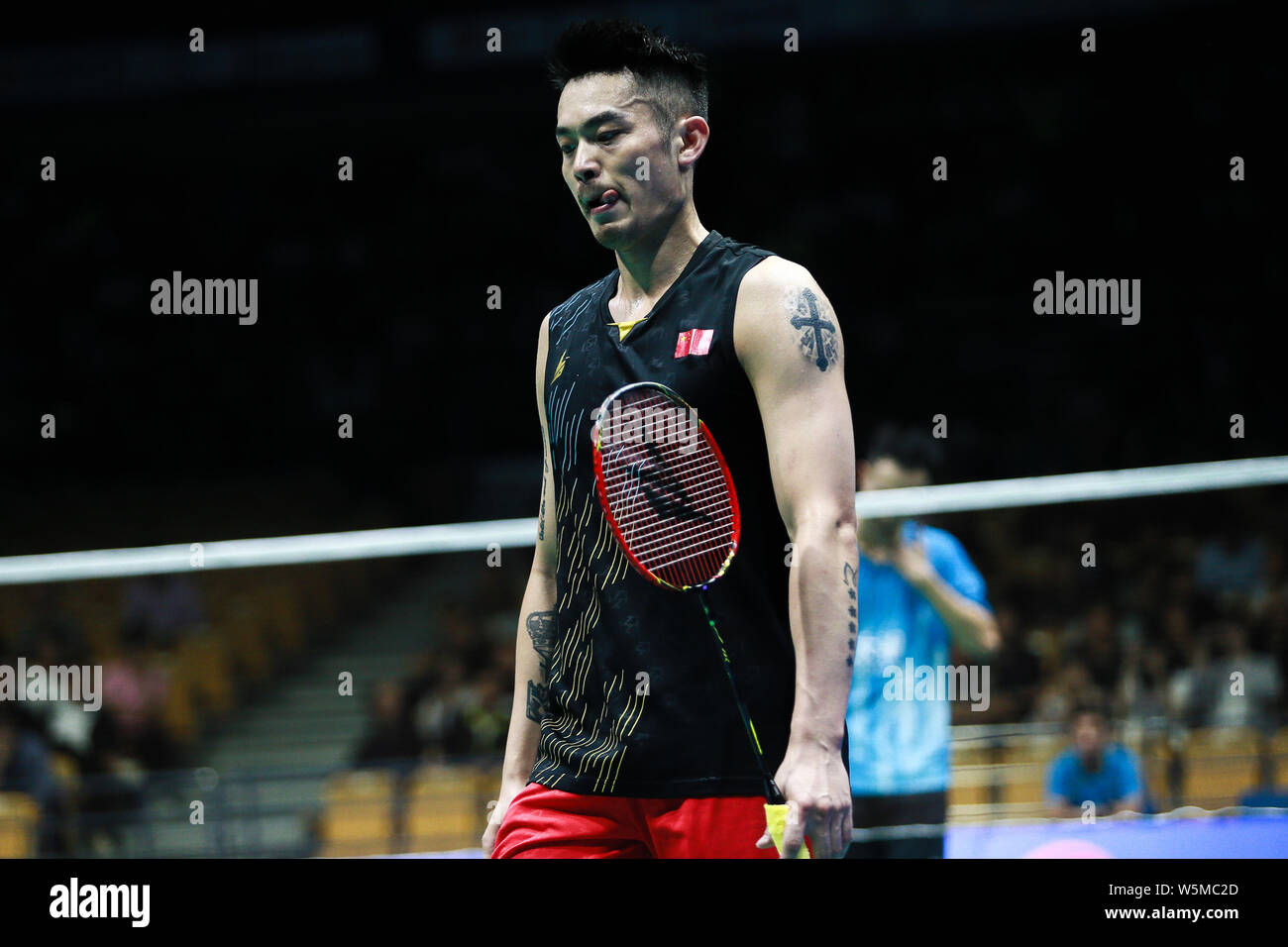 Lin Dan of China reacts while competing against Lu Chia-hung of Chinese ...