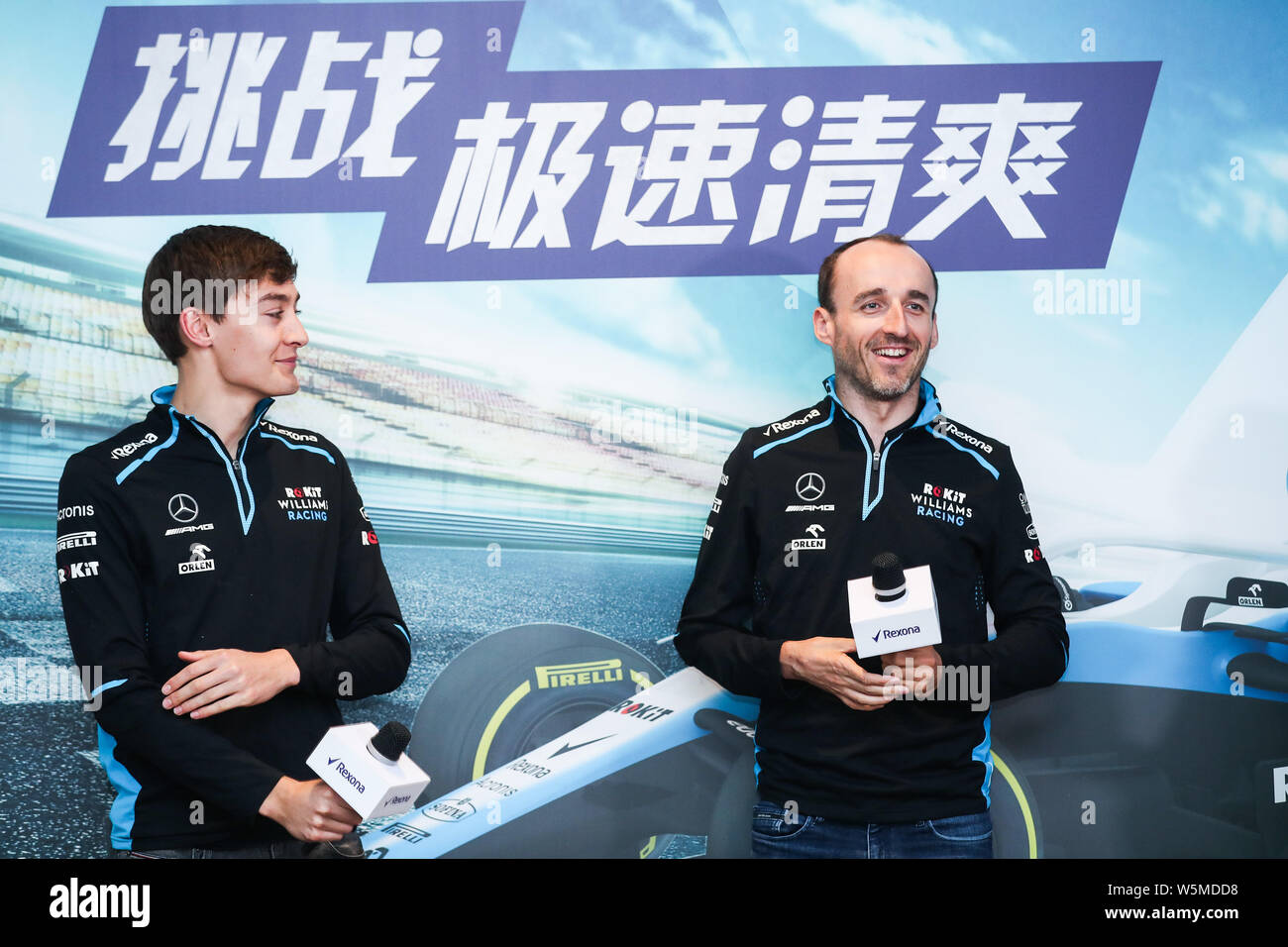 Polish Formula One driver Robert Kubica, right, and British Formula One ...