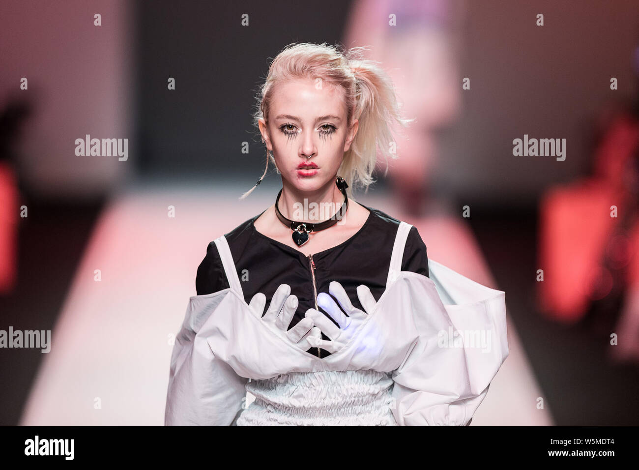 A model displays a new creation at the Devil Beauty show during the ...