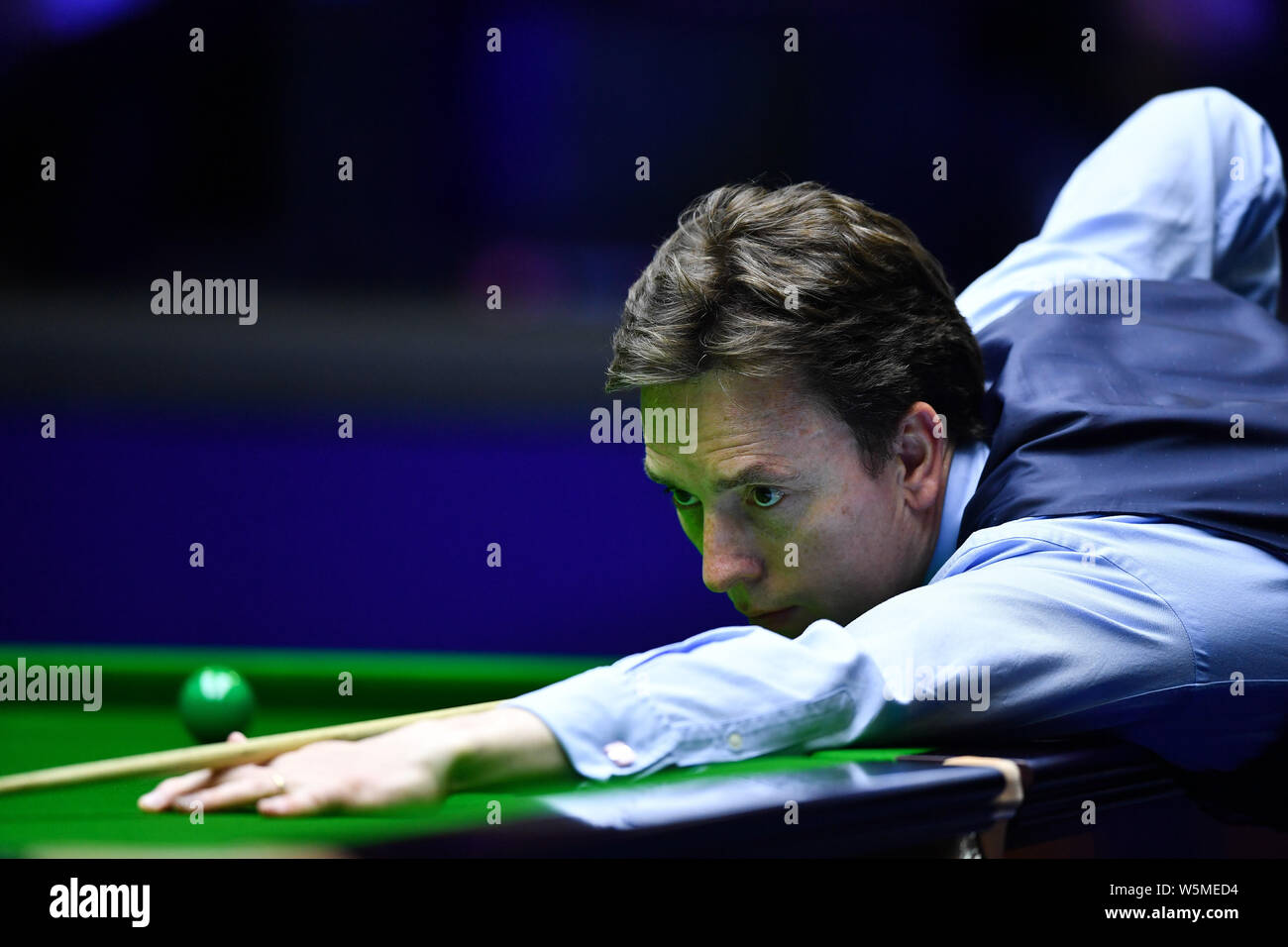 Ken Doherty of Ireland plays a shot to Mark Williams of Wales in the ...