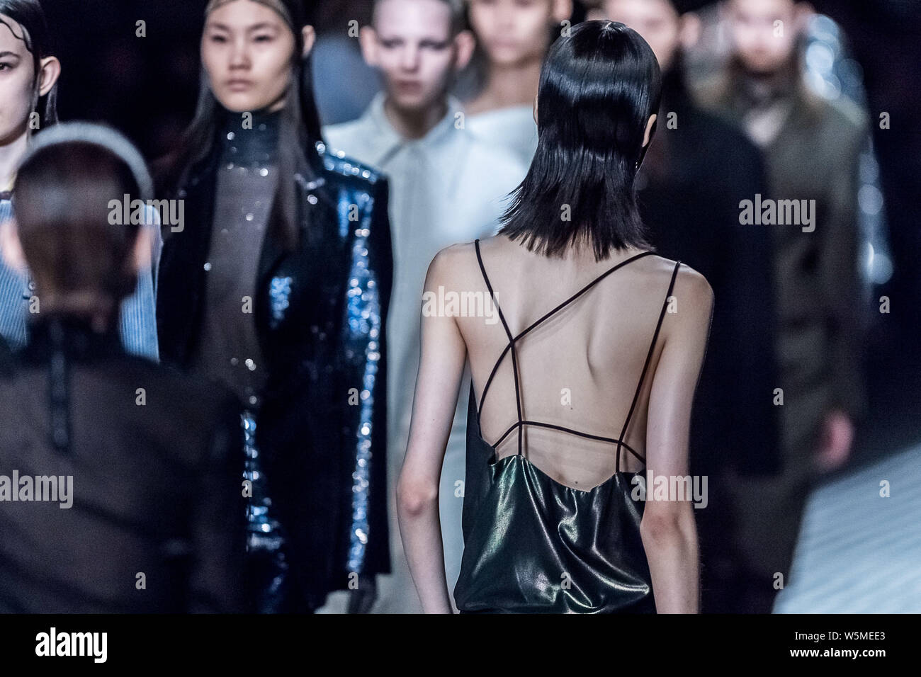 Chinese designer You Yue poses at the YOEYYOU show during the Shanghai ...