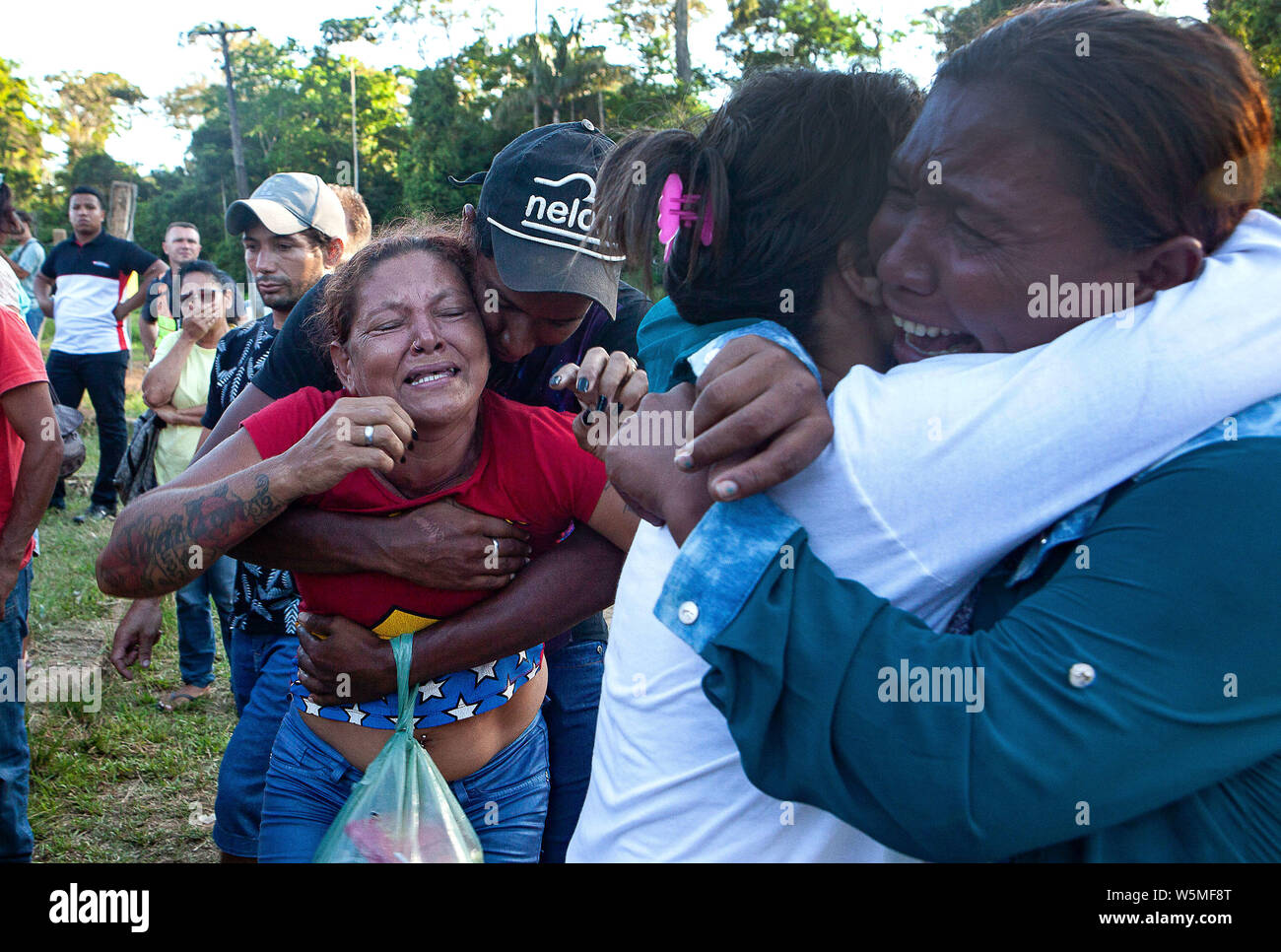 Altamira, Brazil. 29th July, 2019. Relatives grieve after dozens of ...