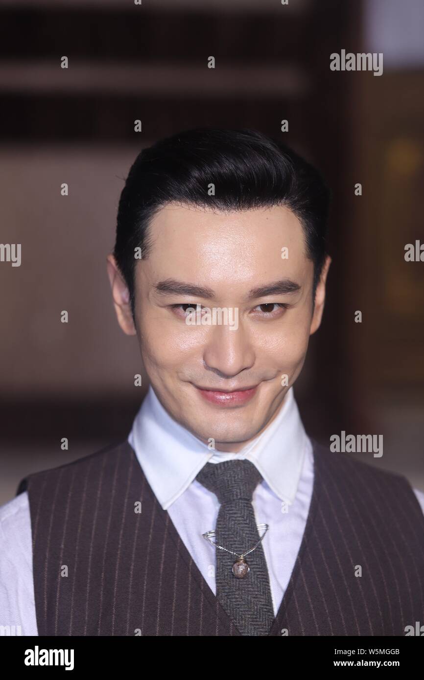 Chinese actor Huang Xiaoming poses during a filming session on set of ...