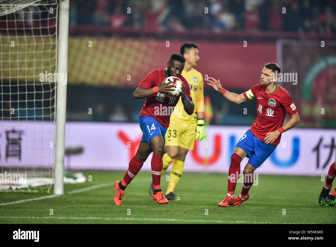 Cameroonian football player Franck Ohandza of Henan Jianye celebrates ...