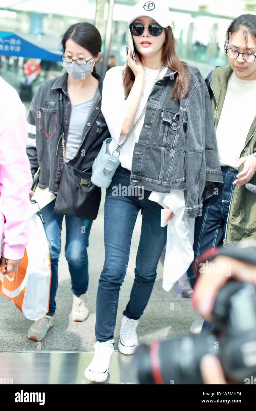 Chinese singer and actress Qin Lan arrives at the Beijing Capital ...