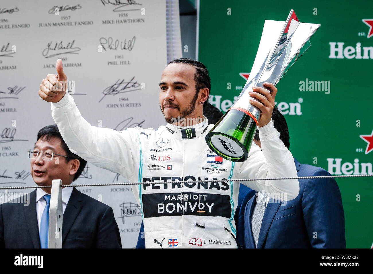 Mercedes driver lewis hamilton poses hi-res stock photography and ...