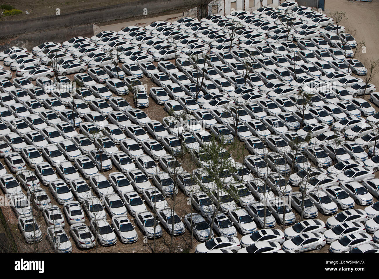 Broken and abandoned electric vehicle (EV) of a Chinese car-sharing ...