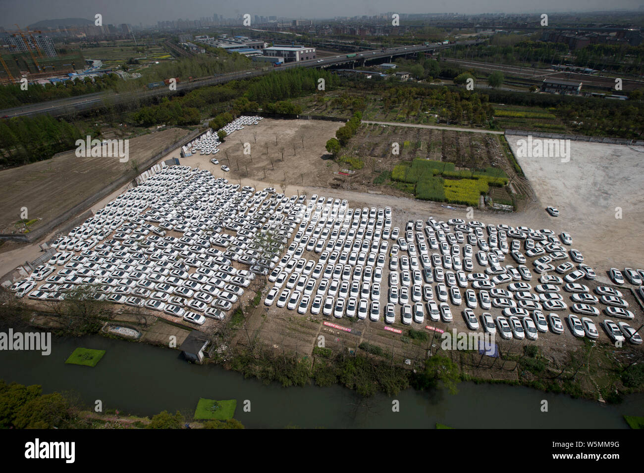 Broken and abandoned electric vehicle (EV) of a Chinese car-sharing ...