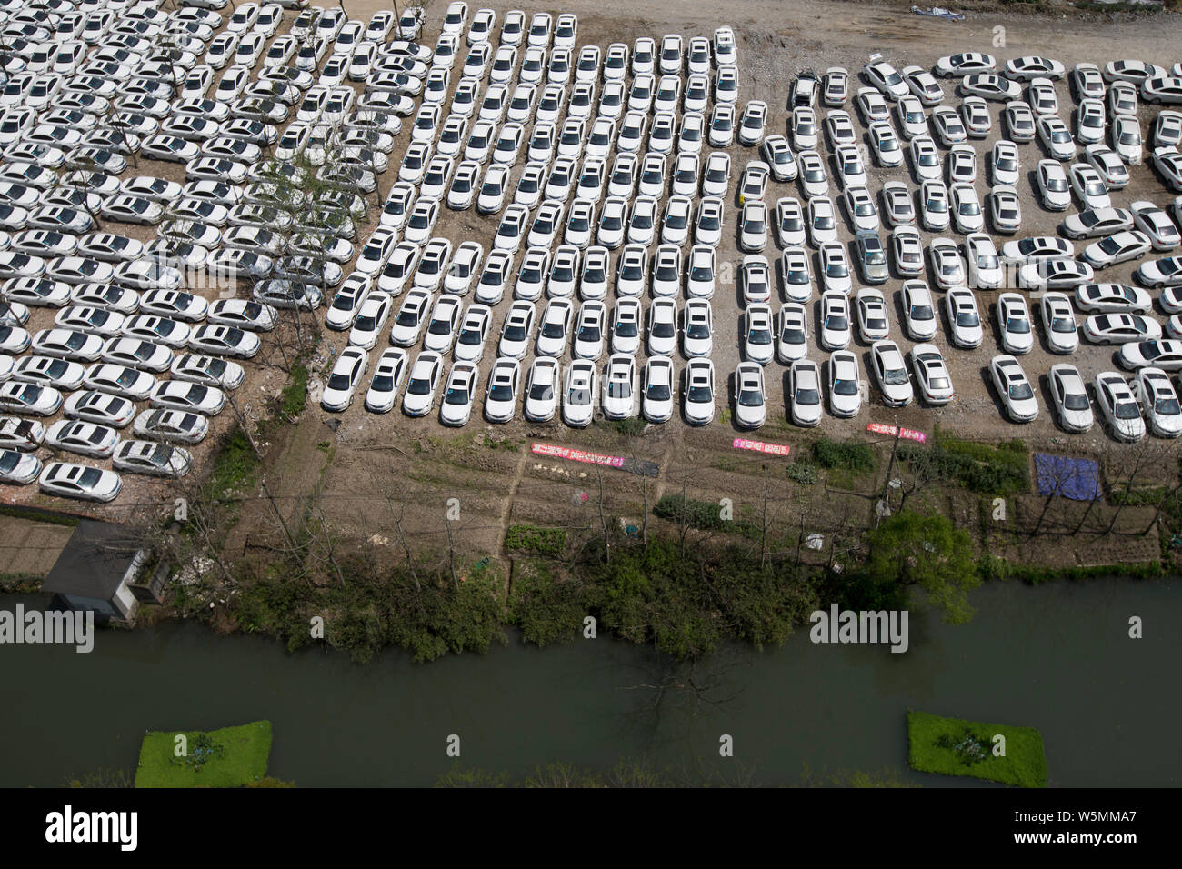 Broken and abandoned electric vehicle (EV) of a Chinese car-sharing ...