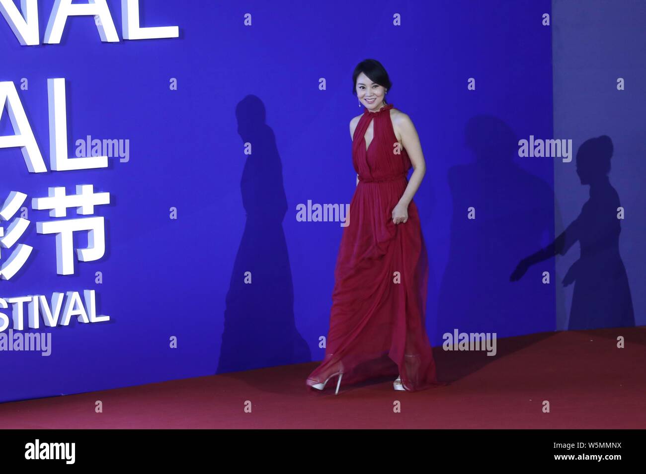 Chinese actress Yan Ni arrives on the red carpet for the closing and ...