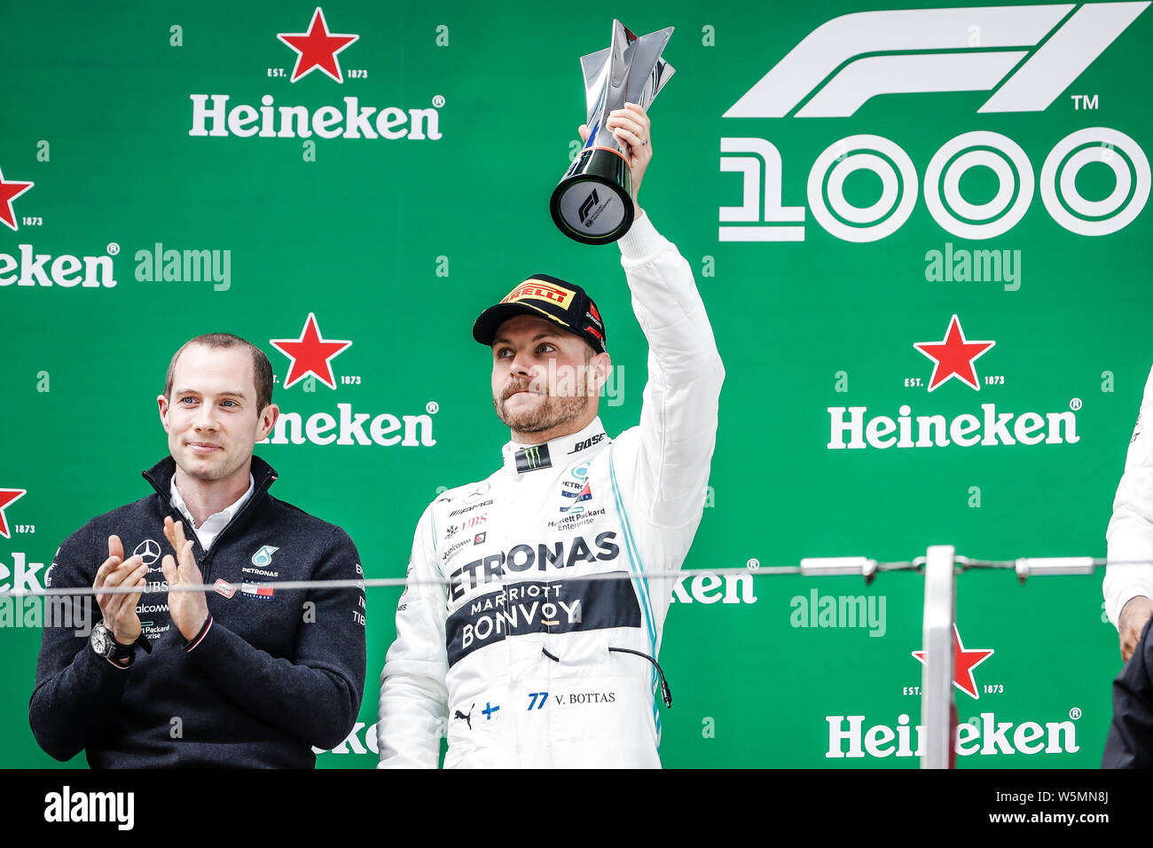 Finnish Formula One driver Valtteri Bottas of Mercedes poses with his ...
