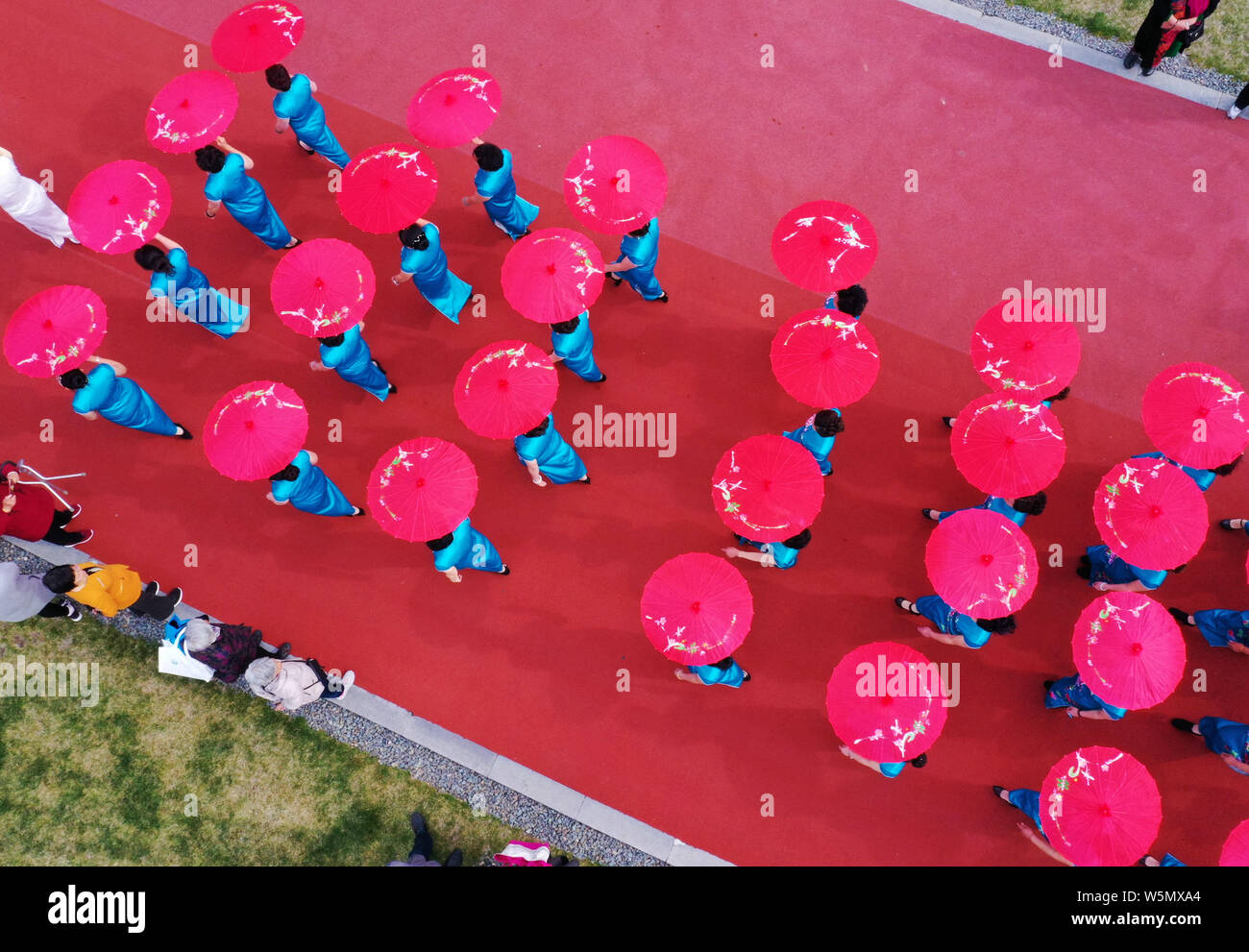 Chinese women dressed in Cheongsam, a traditional Chinese dresses also ...