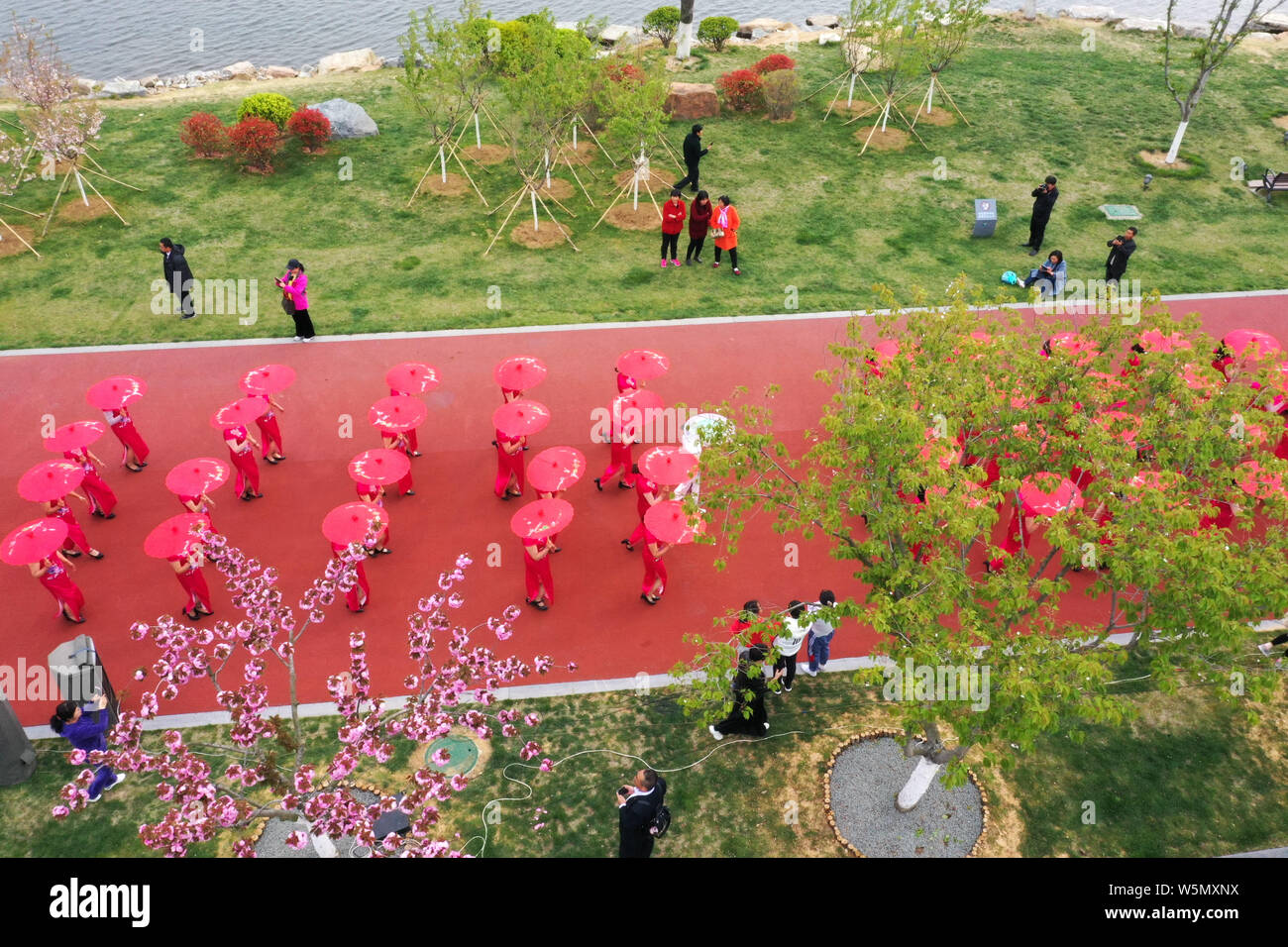 Chinese women dressed in Cheongsam, a traditional Chinese dresses also ...