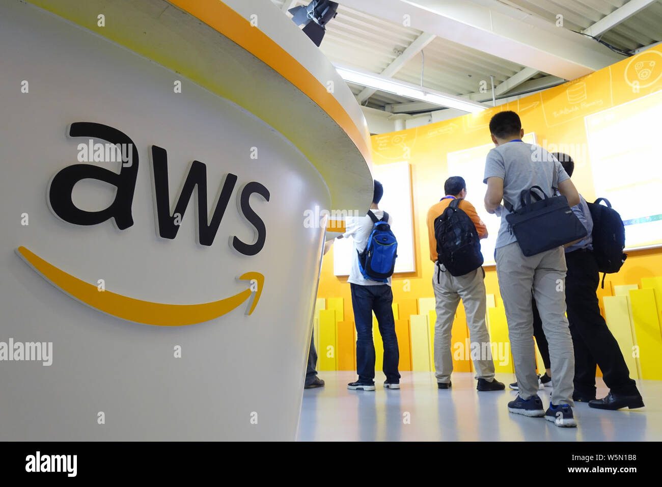 --FILE--People visit the stand of Amazon during an expo in Shanghai ...