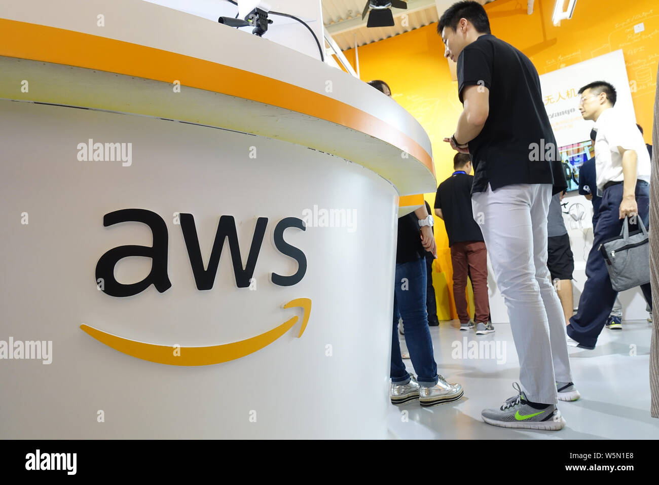 --FILE--People visit the stand of Amazon during an expo in Shanghai ...