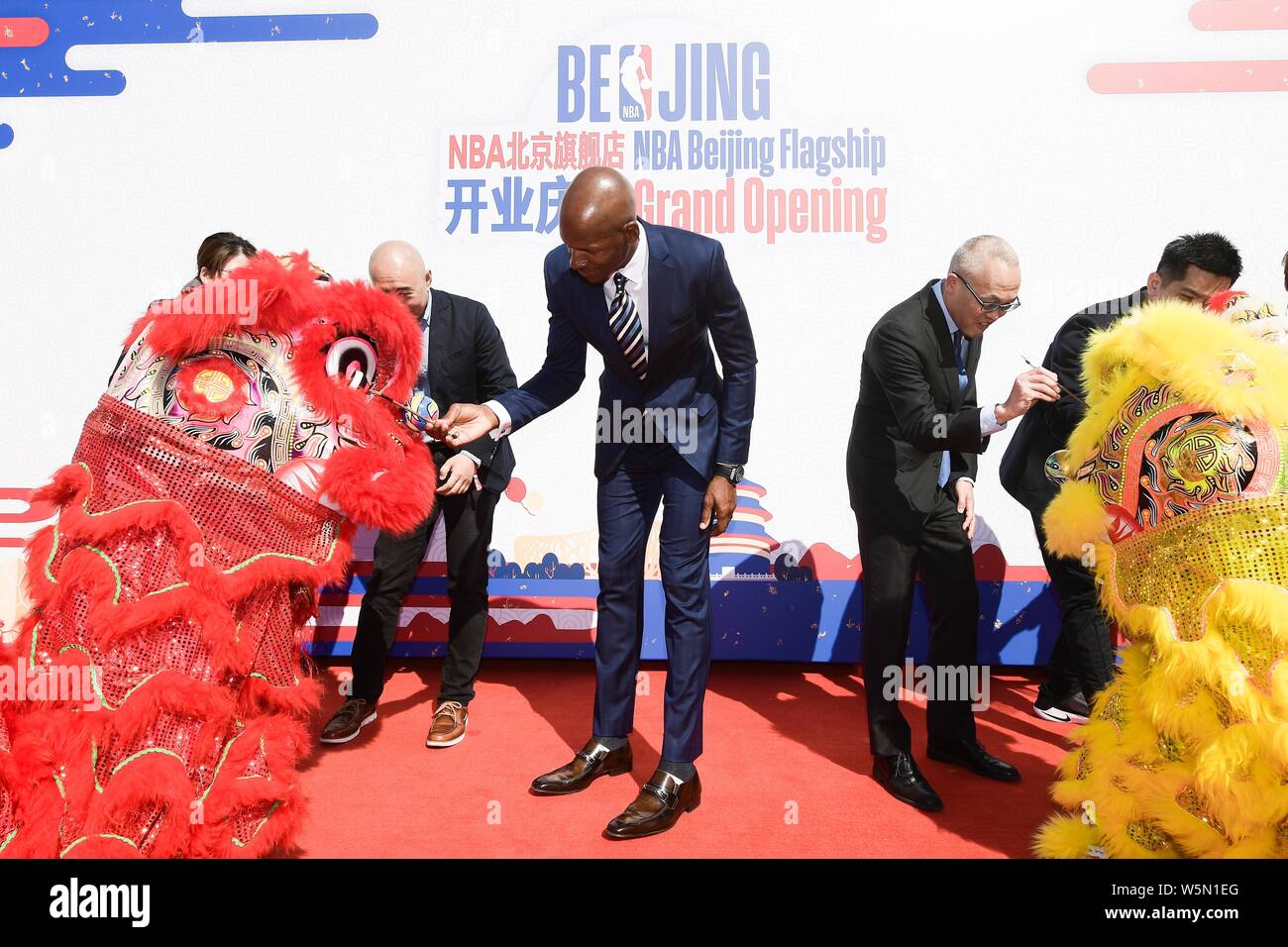 Retired American basketball player Ray Allen, center, attends the ...