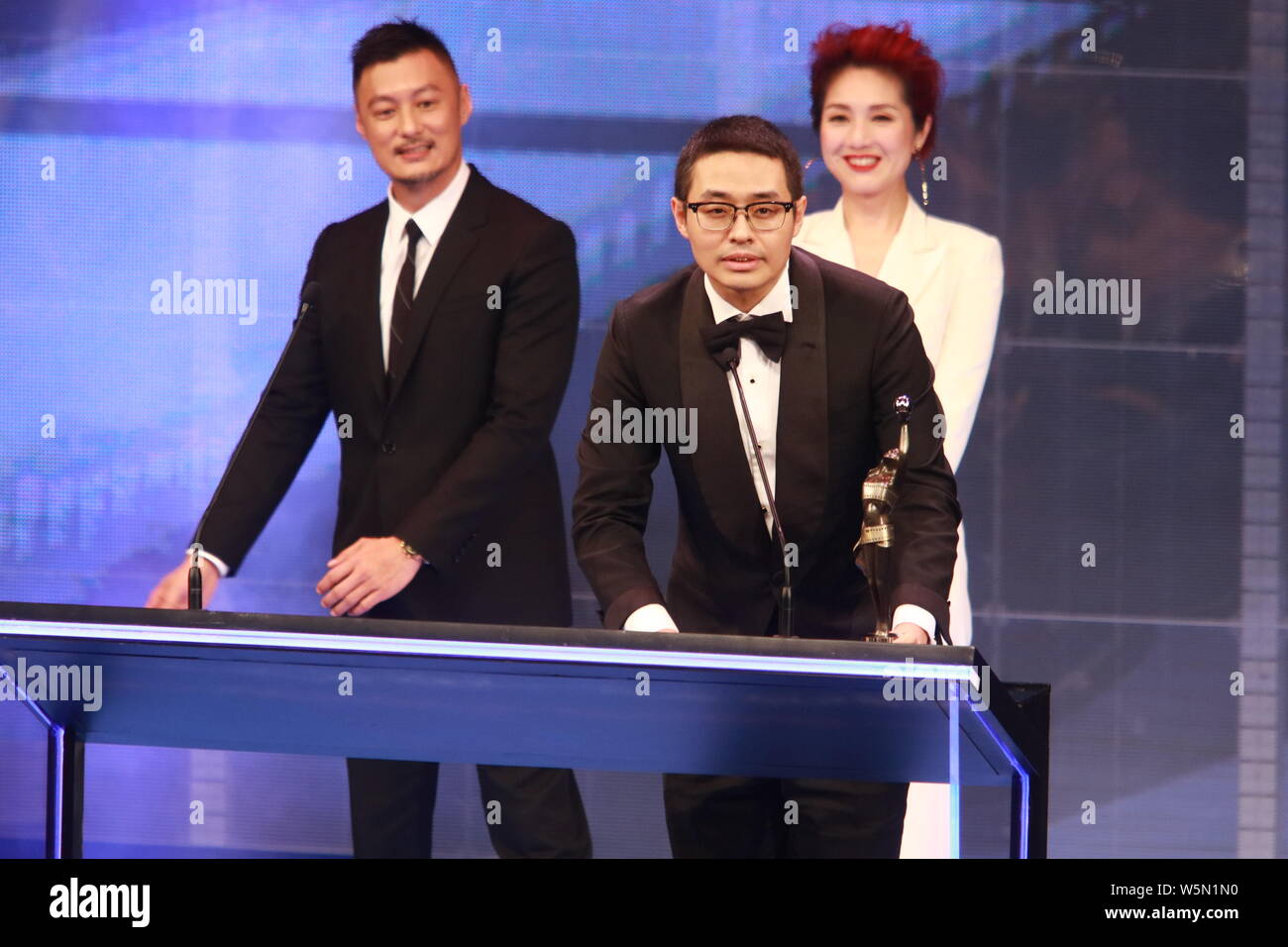 Chinese director Wen Muye poses with trophy for the "Best Film from ...