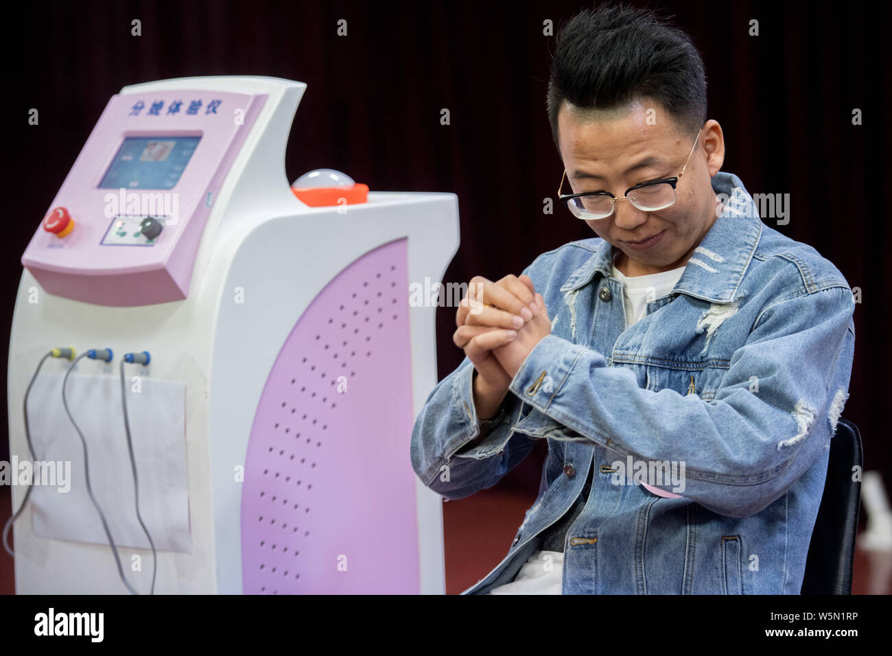 The face of an expectant father contorts as he experiences the pain of ...