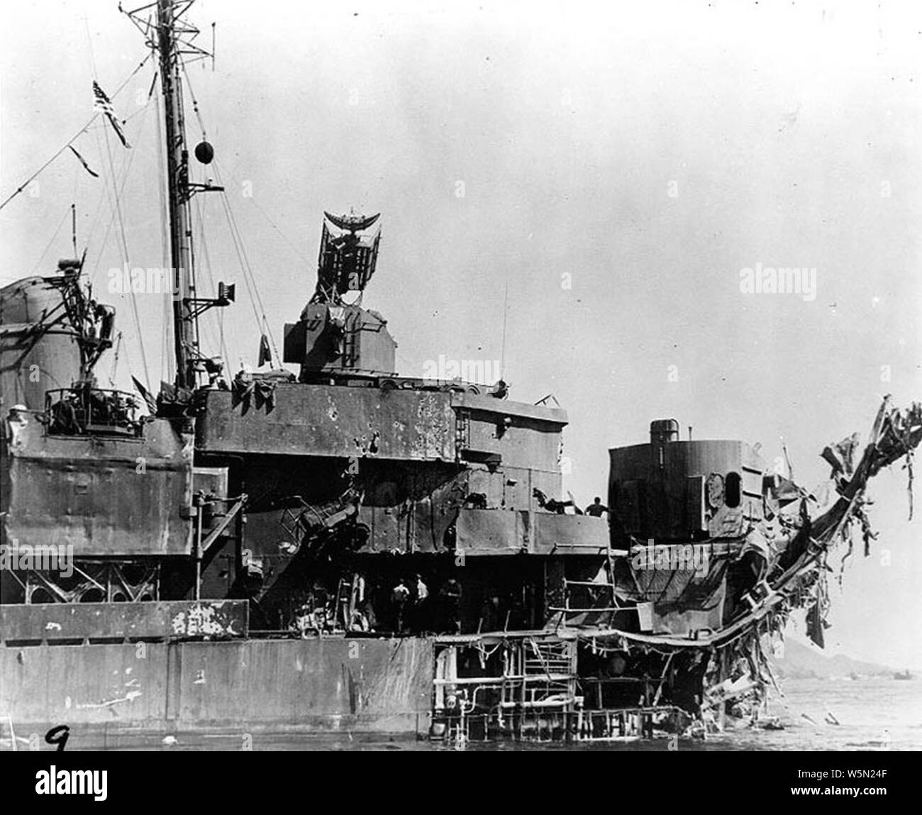 Damaged forward hull and superstructure of USS Lindsey (DM-32) at ...