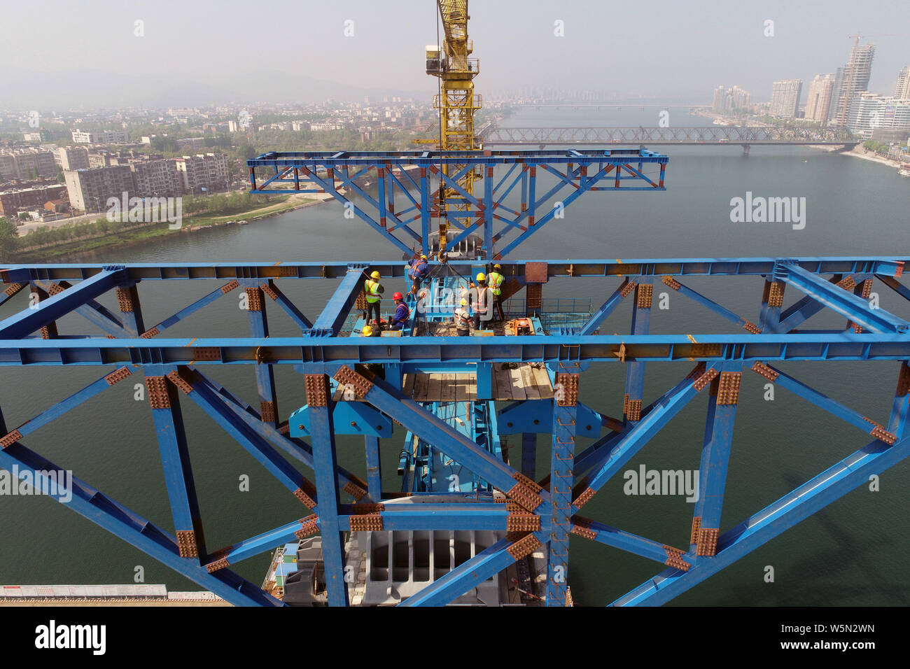Aerial view of the Panggong suspension bridge under construction in ...