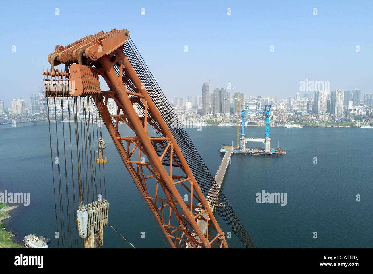 Aerial view of the Panggong suspension bridge under construction in ...
