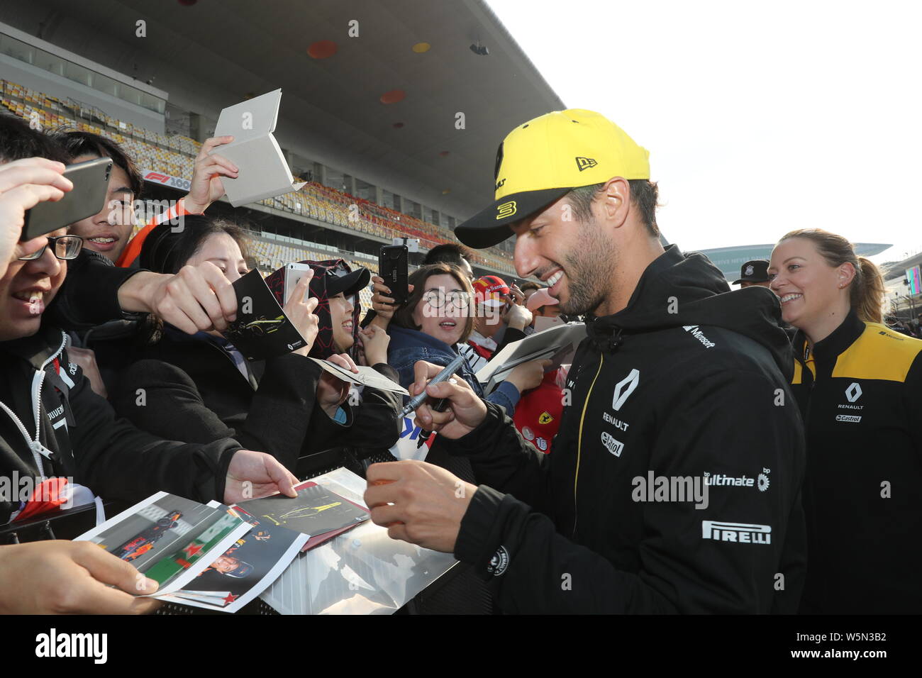 Australian racing driver Daniel Ricciardo of Renault F1 Team signs ...