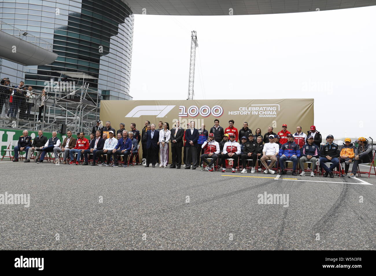 F1 racing drivers, right, pose for photos for the 1000th Celebrating ...