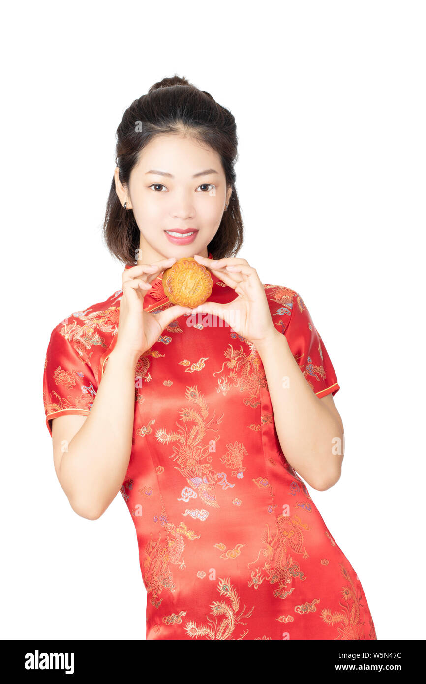 Beautiful Chinese woman wearing a Cheongsam or Chipao holding a Moon ...