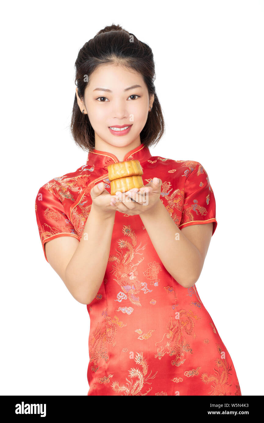 Beautiful Chinese woman wearing a Cheongsam or Chipao holding a Moon ...