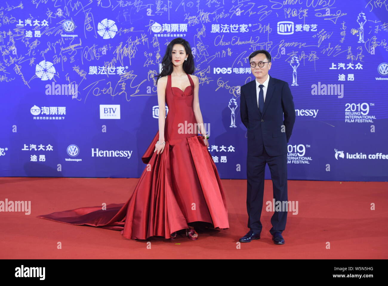Chinese actress Chen Duling poses as she arrives on the red carpet for the opening ceremony of ...
