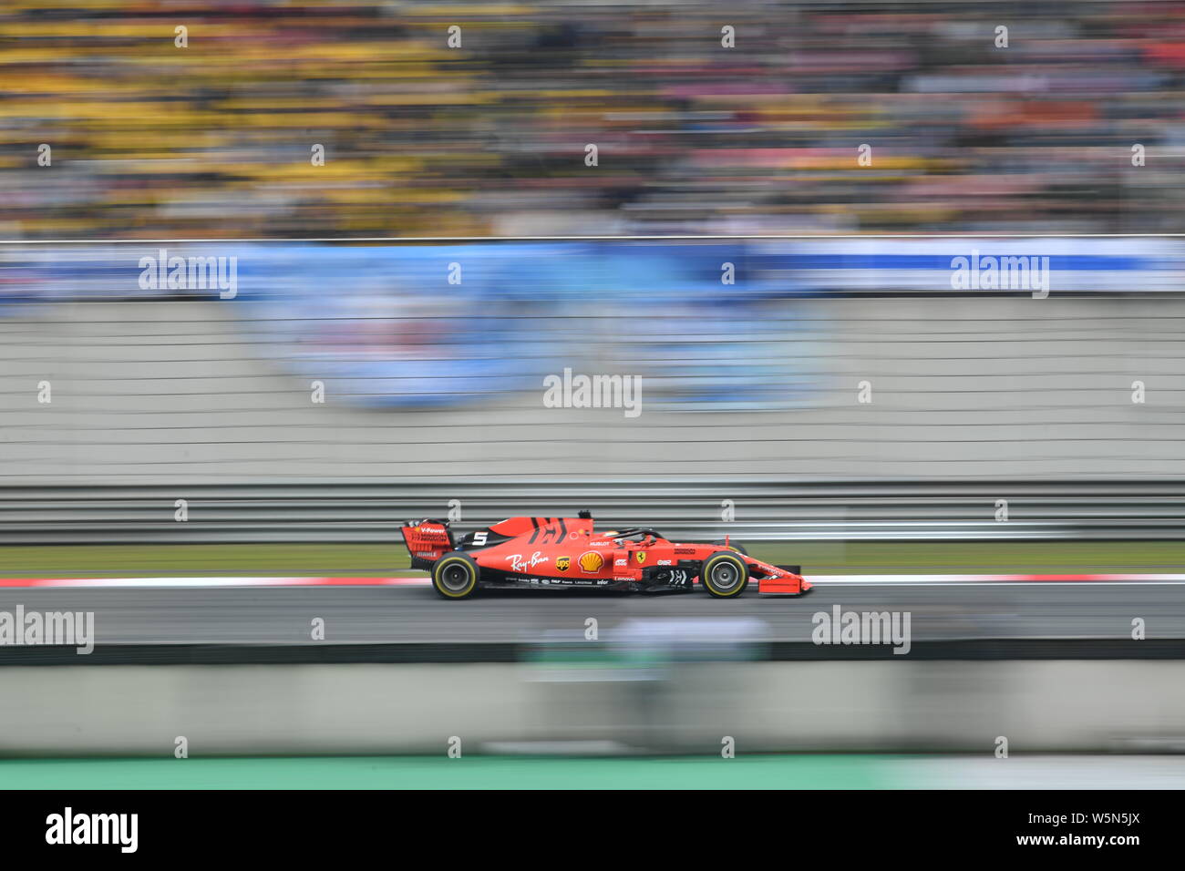 German Formula One driver Sebastian Vettel of Ferrari competes in the ...
