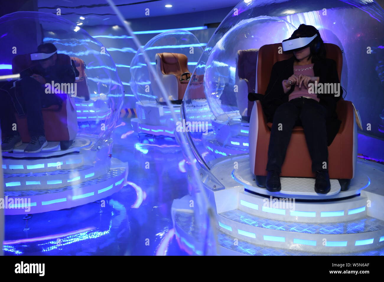 Chinese moviegoers visit the VR movie theater of Er Dong Pictures at ...