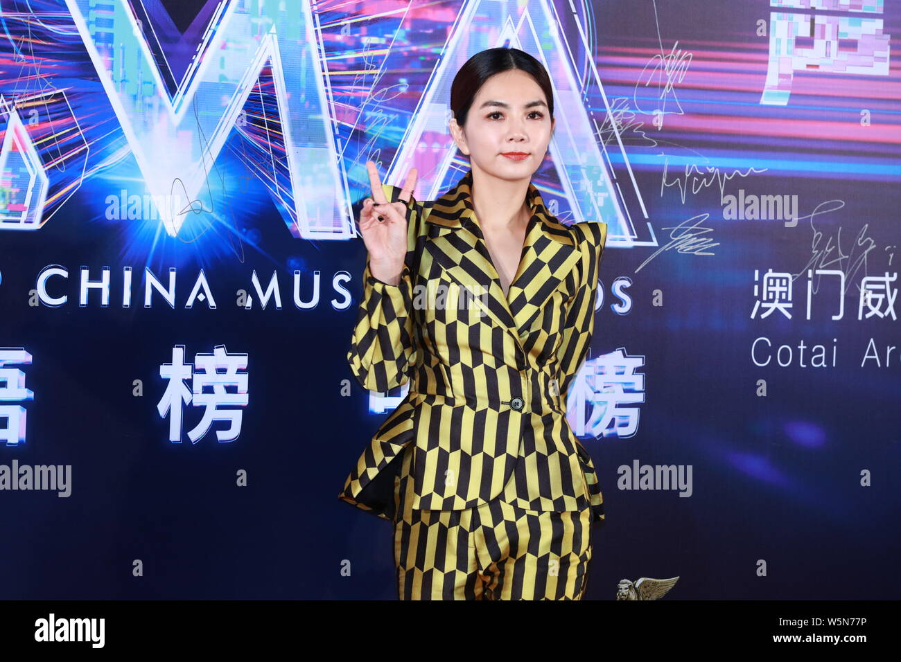 Ella Chen Chia-hwa of Taiwanese girls group S.H.E poses as he arrives ...