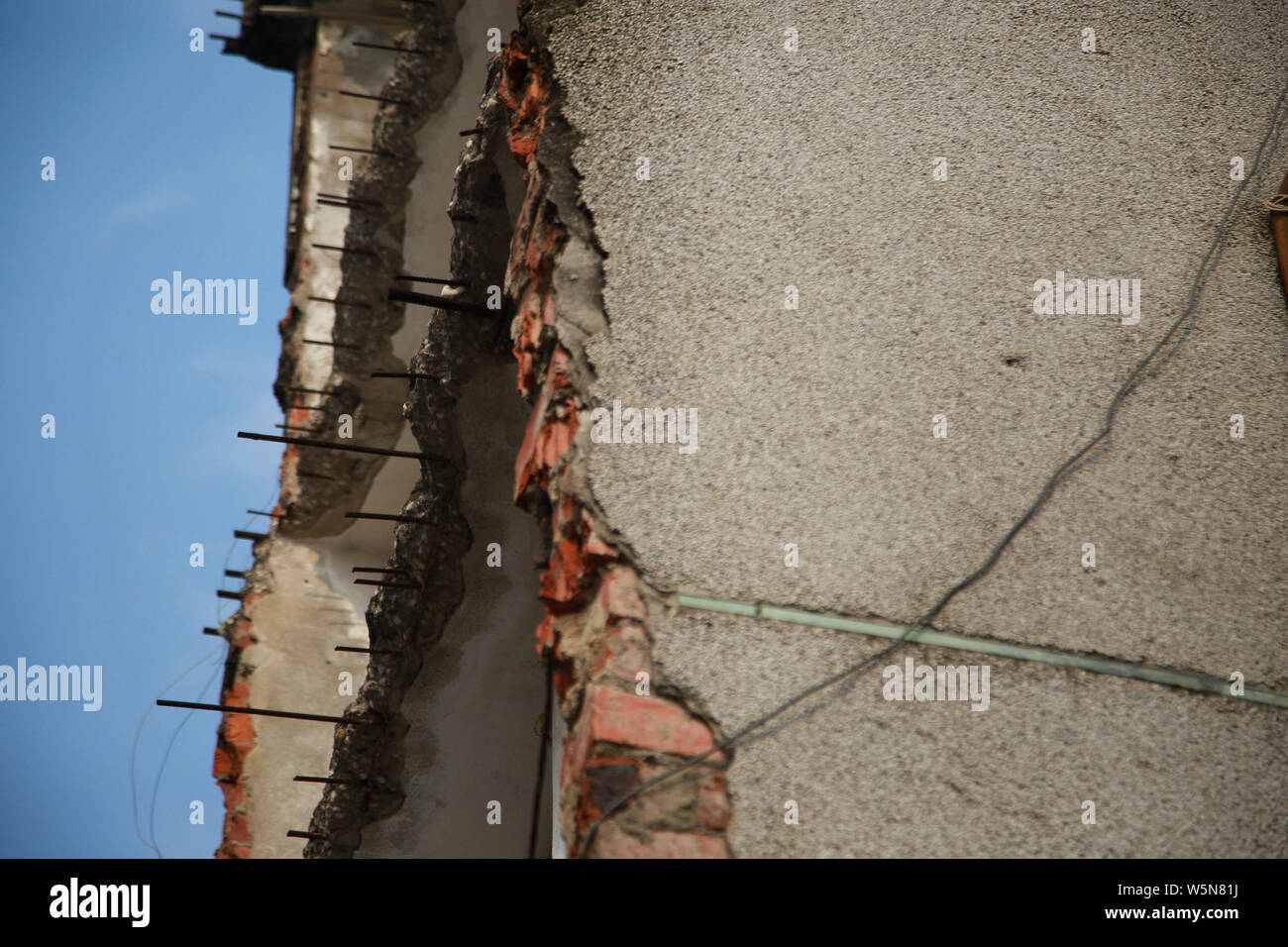 The half-demolished nine-floor residential building is pictured in ...