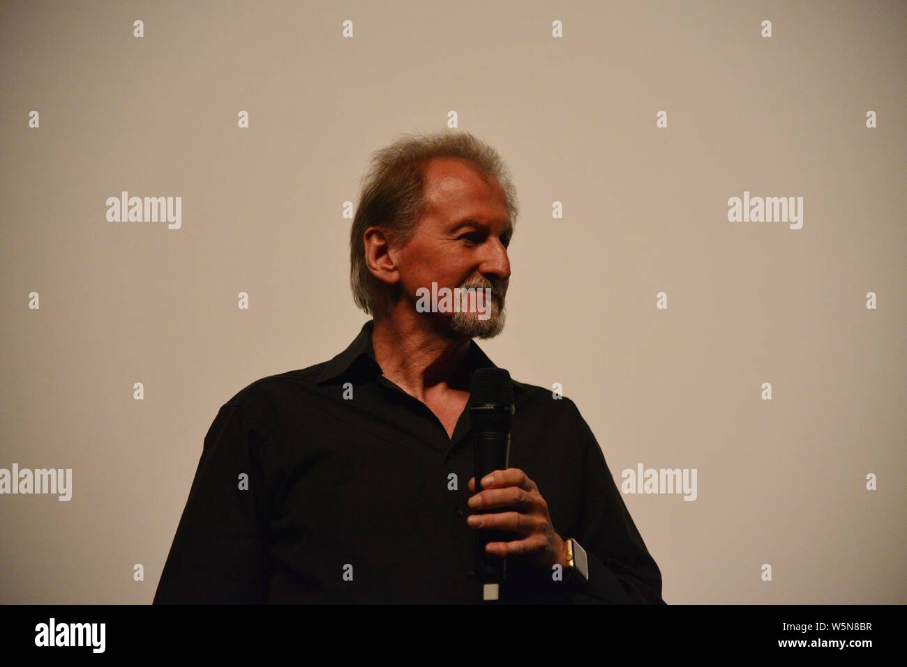 Austrian composer and piano player Gerhard Gruber interacts with ...