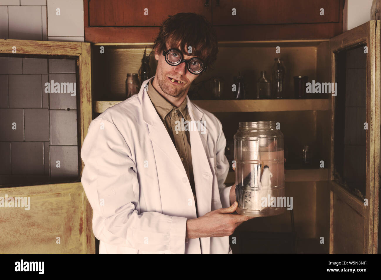 Crazy scientist in his lab doing experiments Stock Photo - Alamy