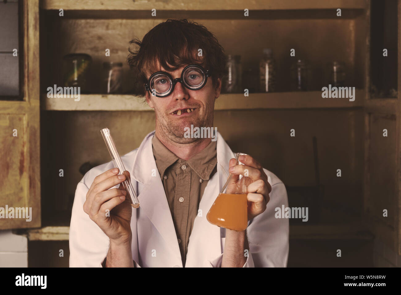 Crazy scientist in his lab doing experiments Stock Photo - Alamy