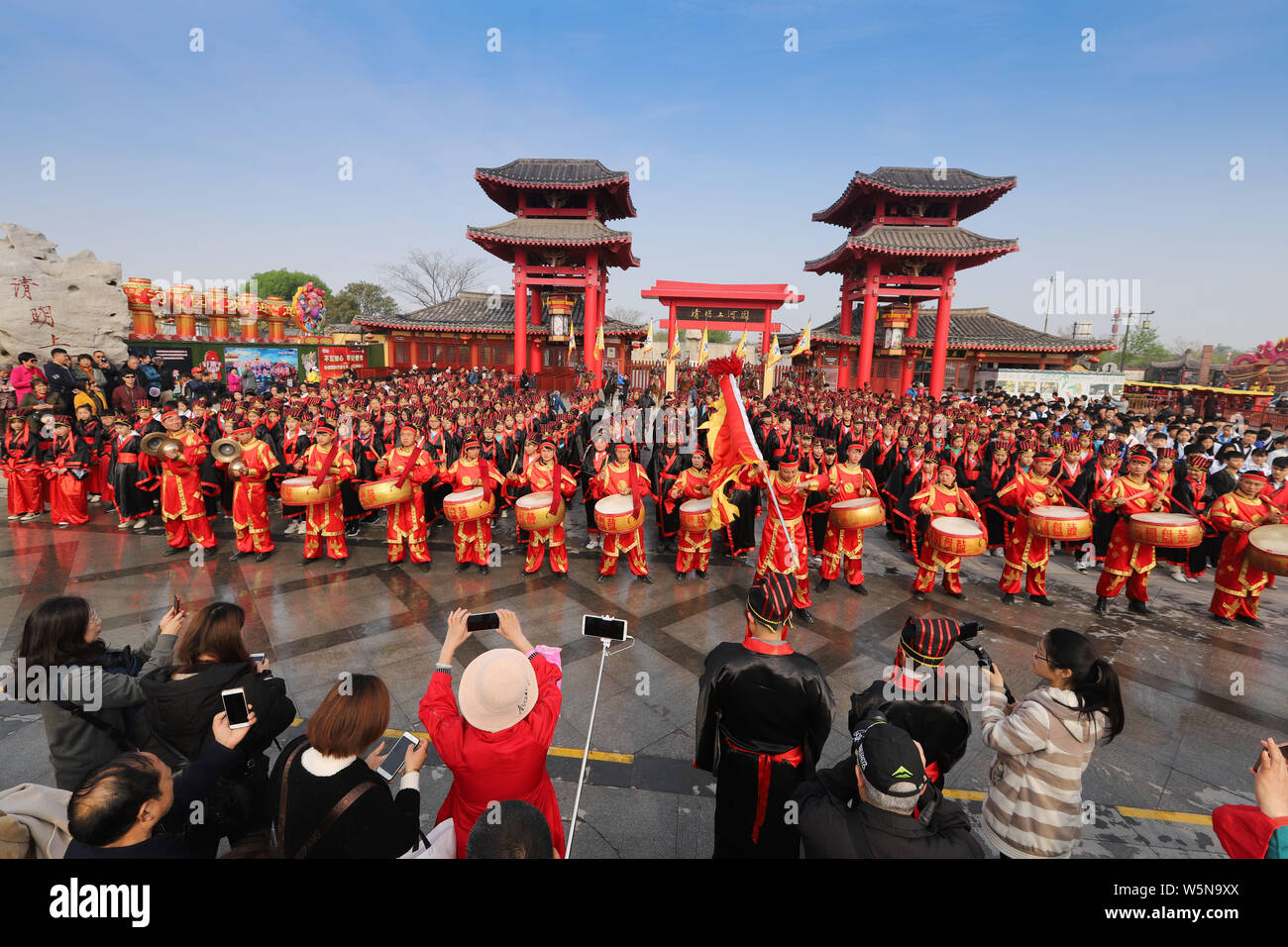 Students dressed in ancient Chinese costumes attend a traditional ...