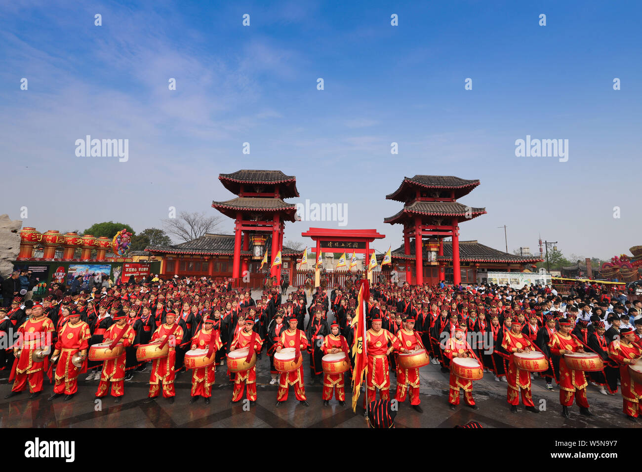 Students dressed in ancient Chinese costumes attend a traditional ...
