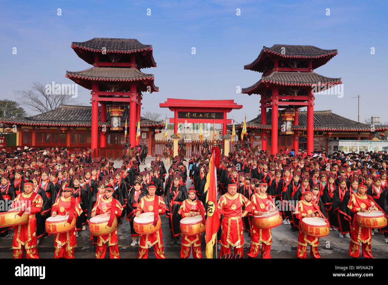 Students dressed in ancient Chinese costumes attend a traditional ...