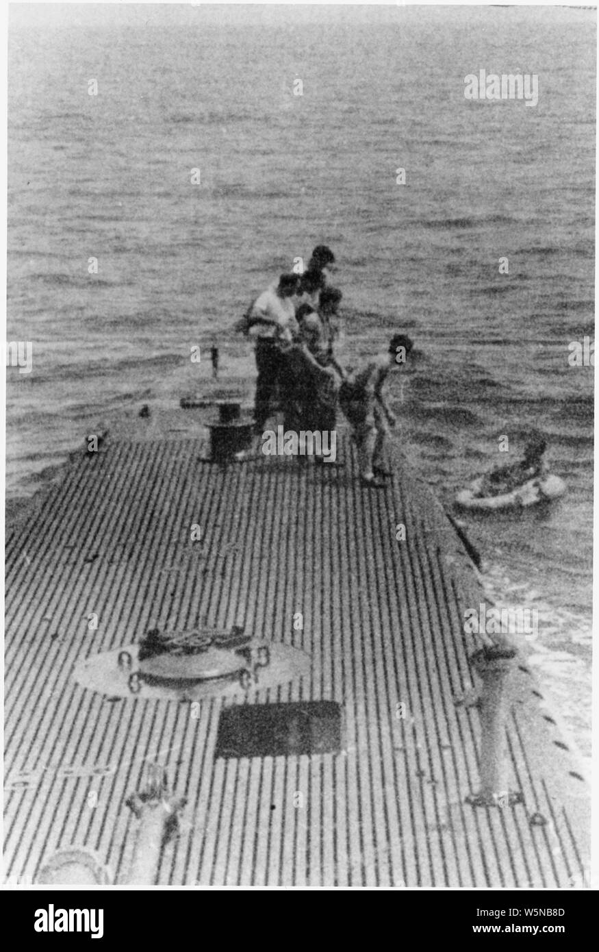 George Bush being rescued by the submarine, the U.S.S. Finback, after ...