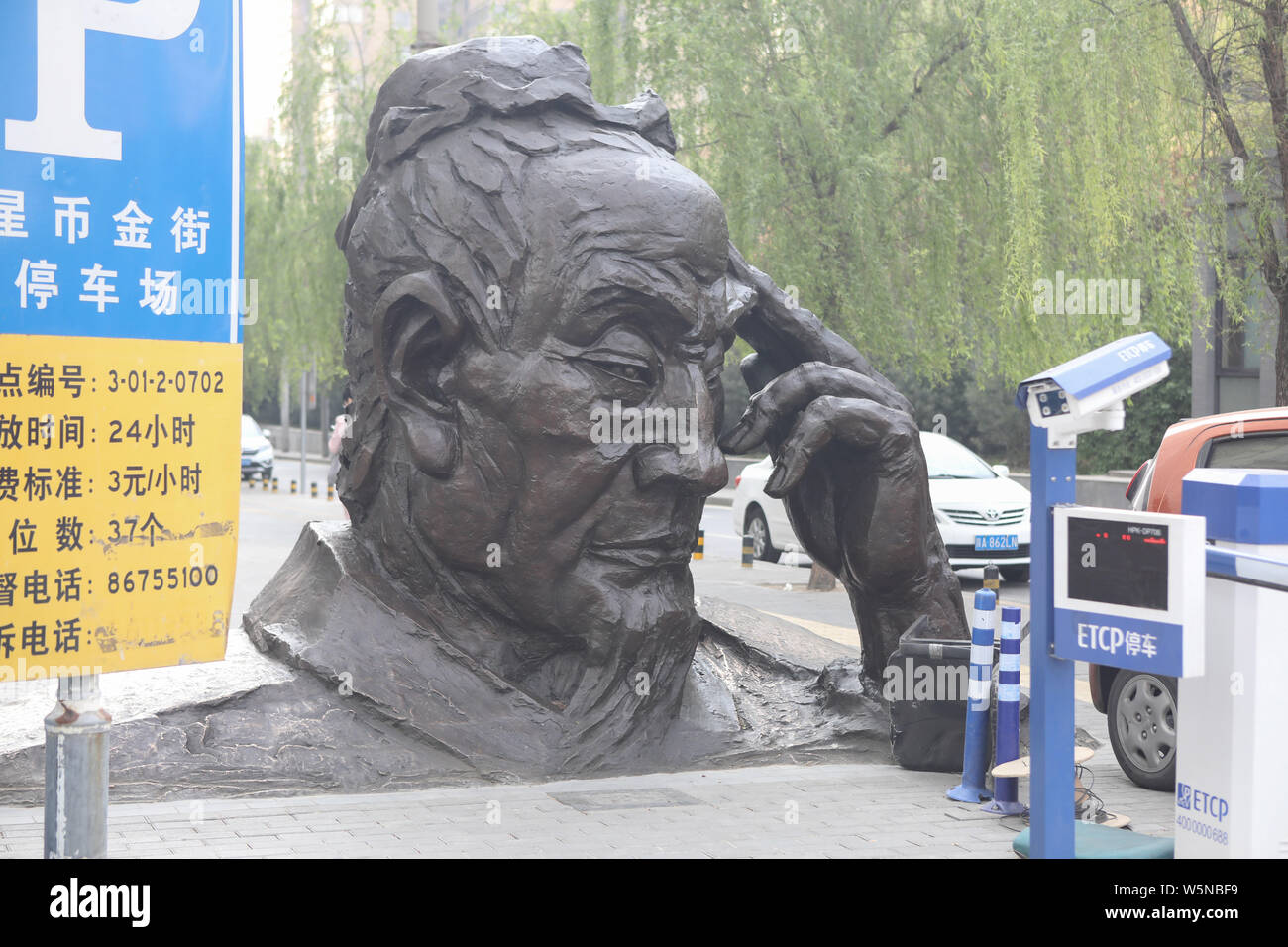 A half-buried sculpture of Sima Qia, Chinese historian of the early Han ...