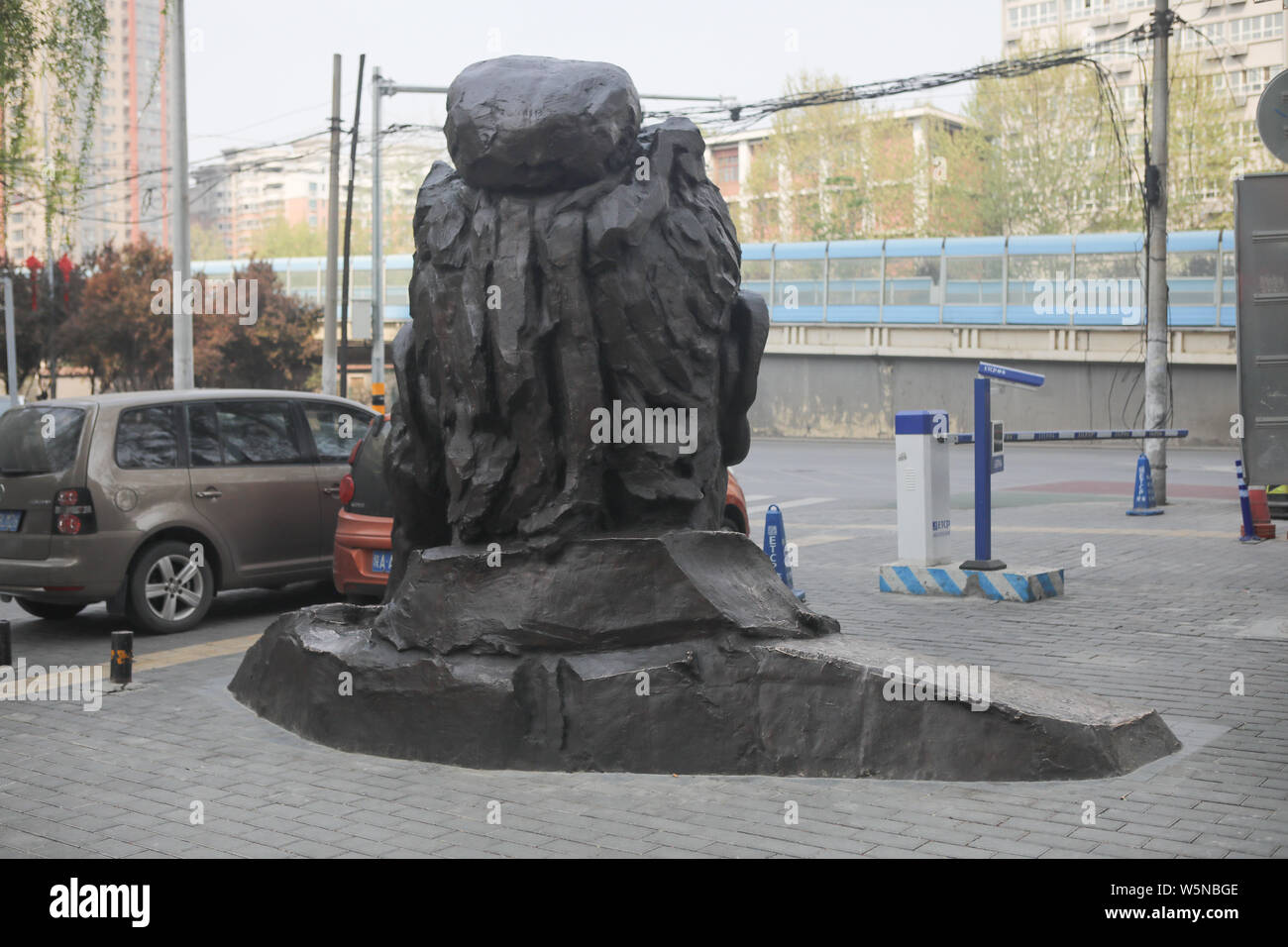 A half-buried sculpture of Sima Qia, Chinese historian of the early Han ...