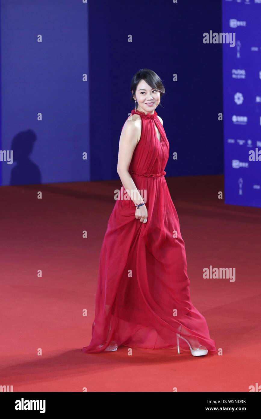 Chinese actress Yan Ni arrives on the red carpet for the closing and ...