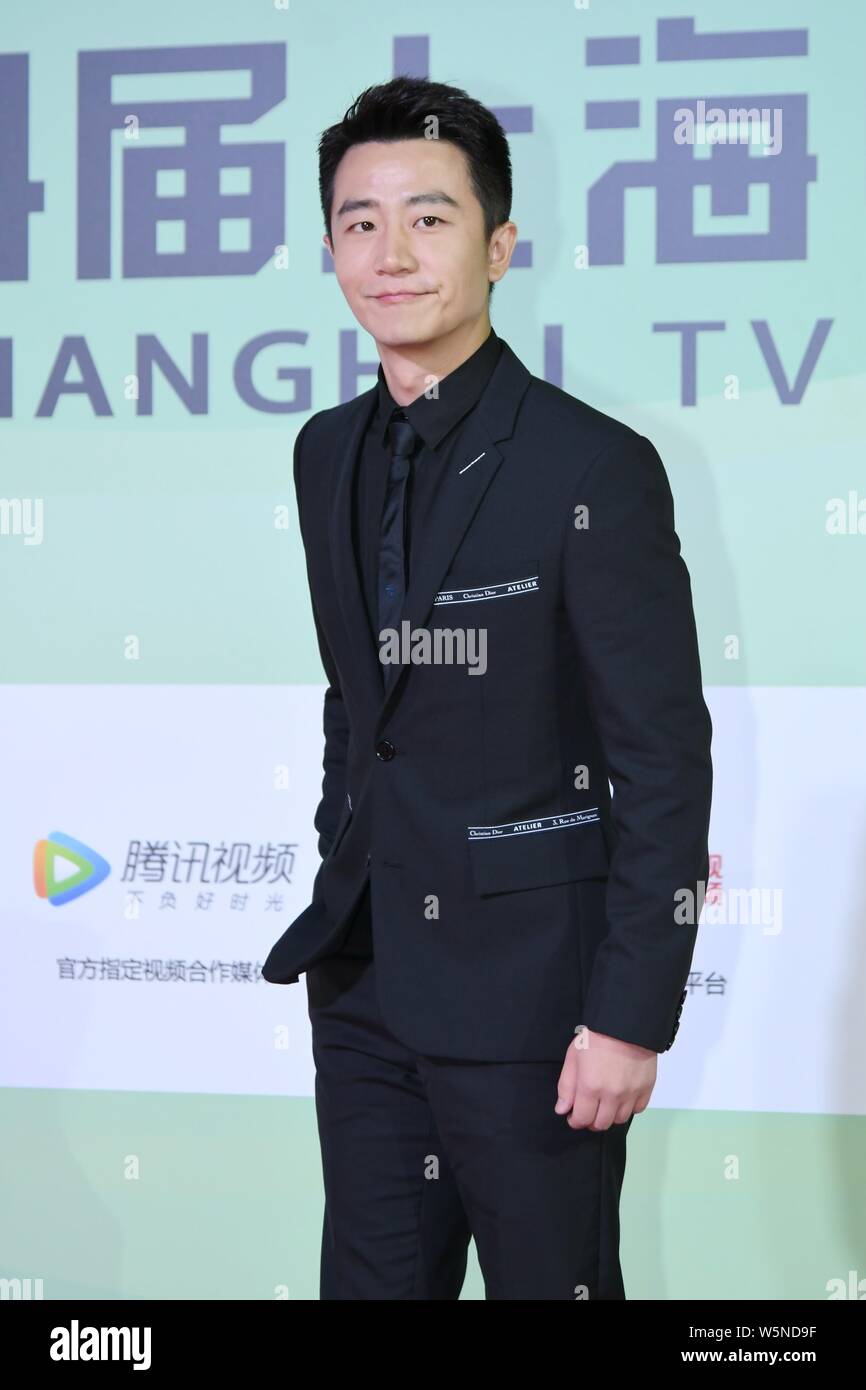 --FILE--Chinese actor Huang Xuan arrives on the red carpet for the ...