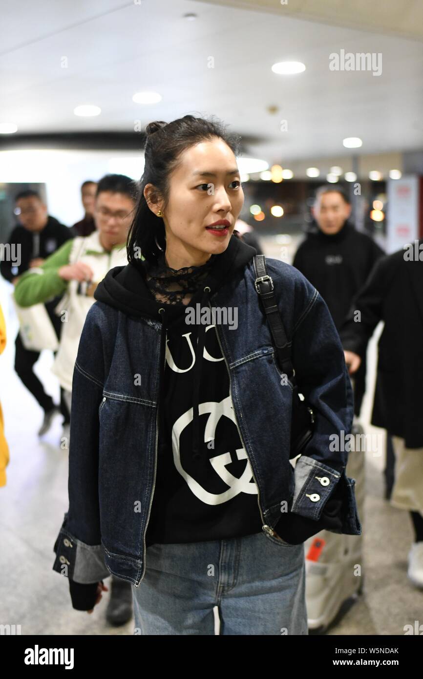 Chinese model Liu Wen arrives at the Beijing Capital International ...