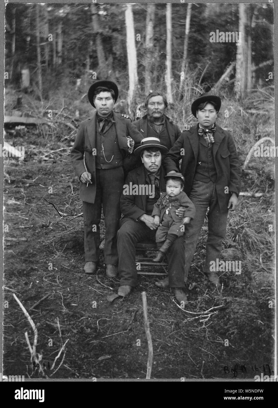 Group of four Indian men with Indian baby. Unidentified Stock Photo - Alamy