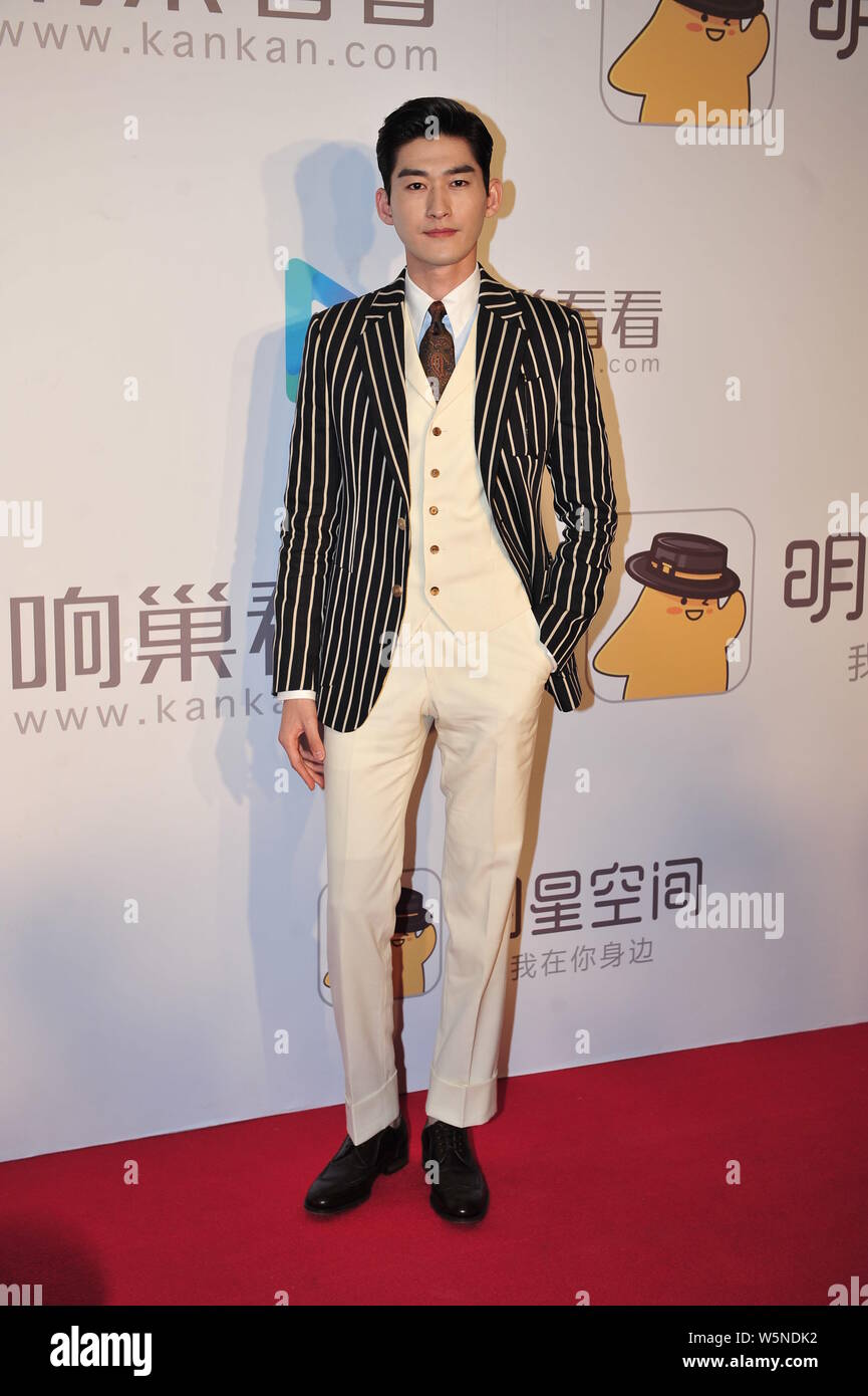 --FILE--Chinese actor Zhang Han arrives on the red carpet for a launch ...