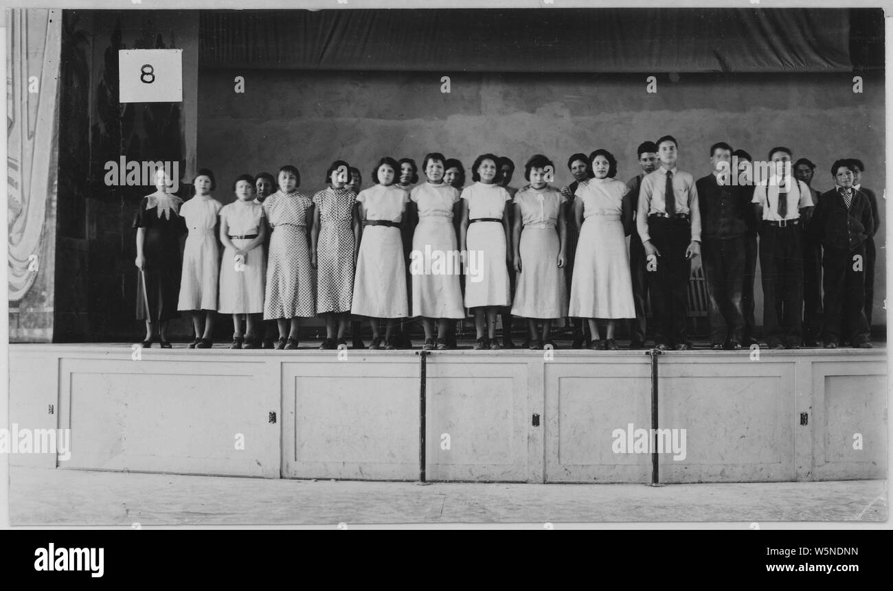 Group of students on the stage; Scope and content: They are probably ...