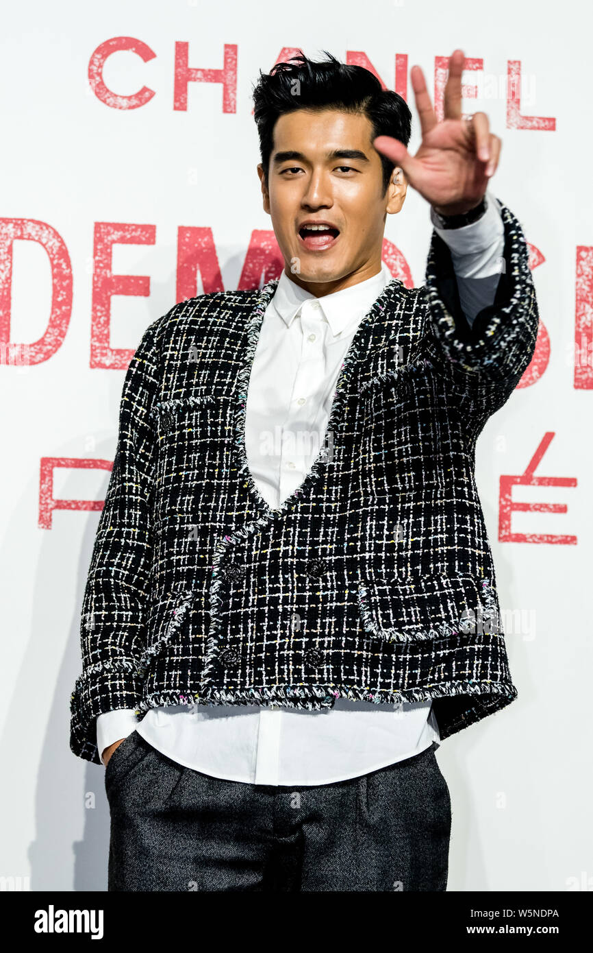 Singaporean singer and actor Nathan Hartono arrives for the Chanel ...